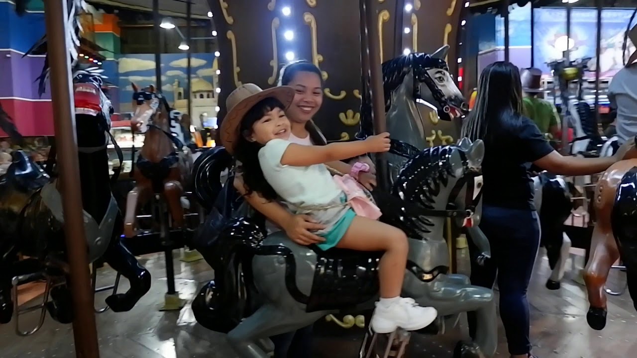 Riding the Merry go round for the first time - YouTube