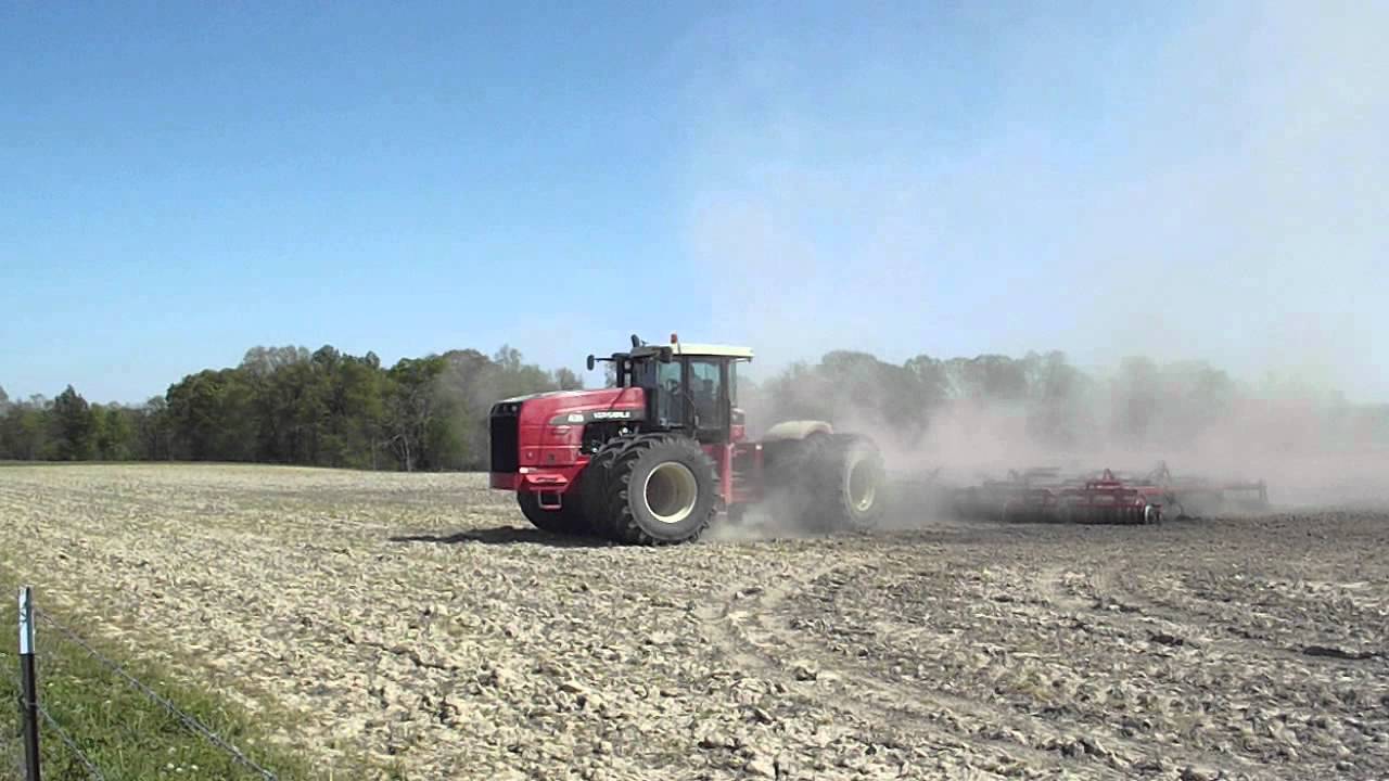 Versatile 435 Tractor pulling a Sunflower 46 foot soil finisher - YouTube