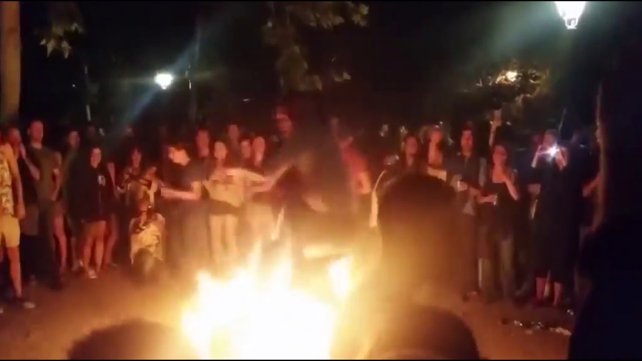Two guys fall into a camp fire - YouTube