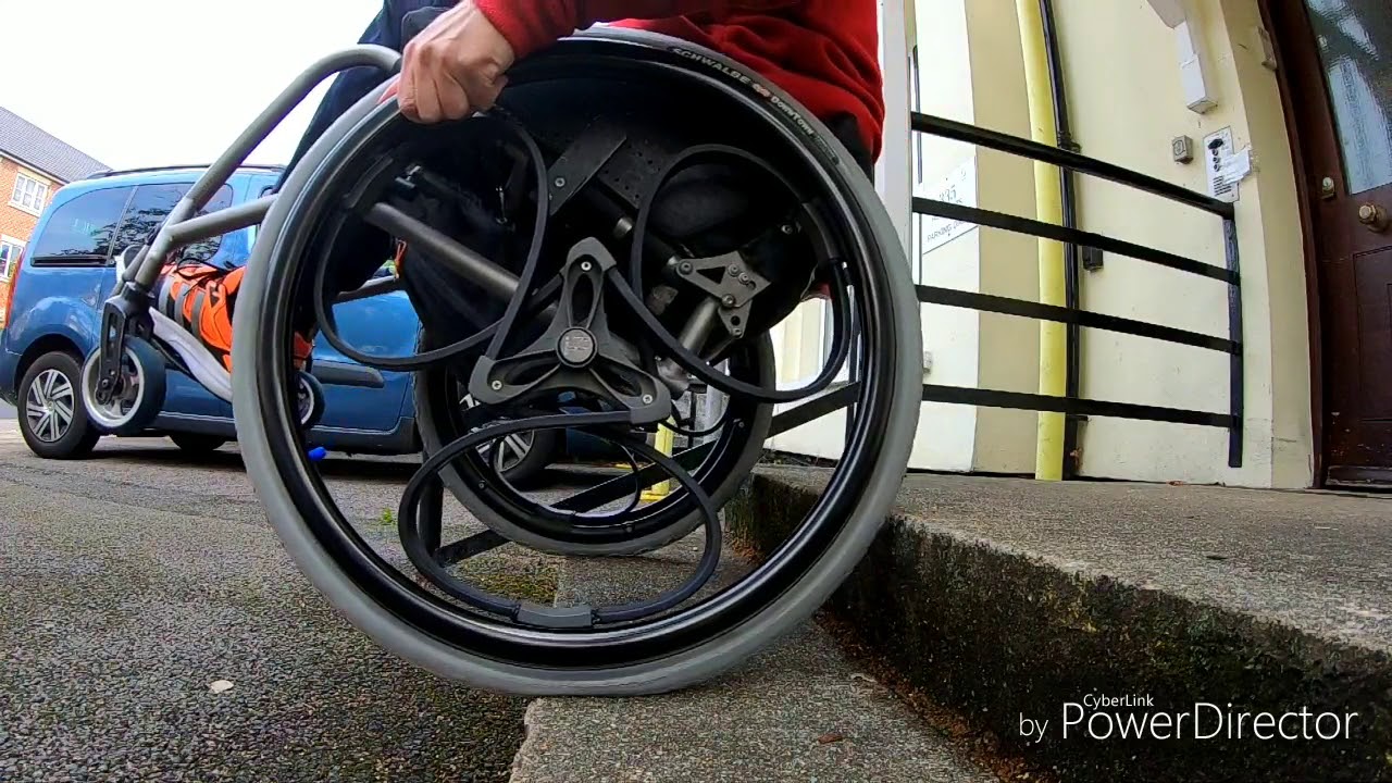 Wheelchair Loopwheels steps in slow motion - YouTube
