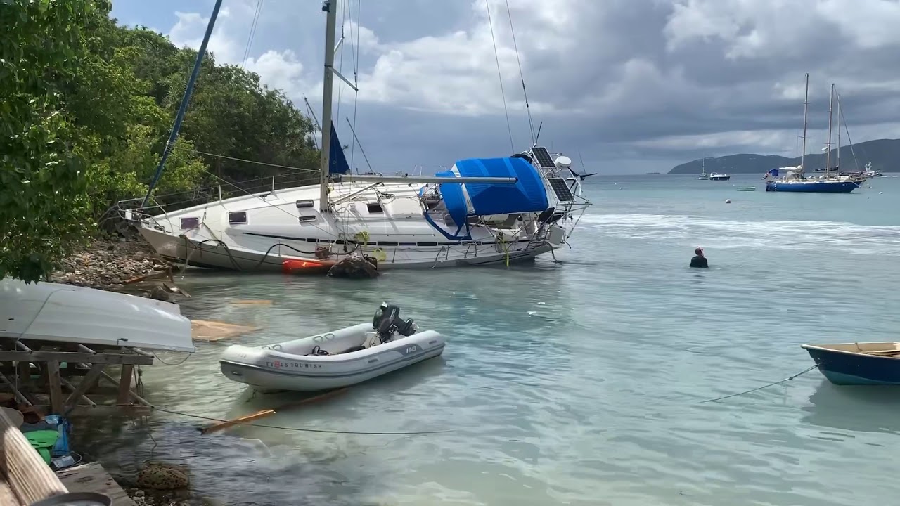 How to get a large sailboat off the rocks!!!!! - YouTube