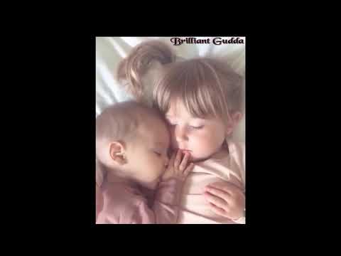 Pretty Little Sister and Cute Adorable Baby Sleeping With Love