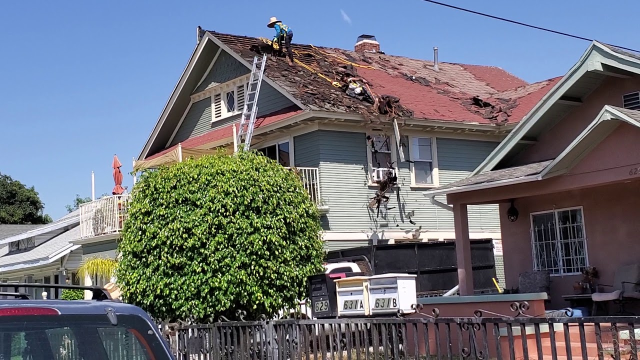 Steep roof demolition - YouTube
