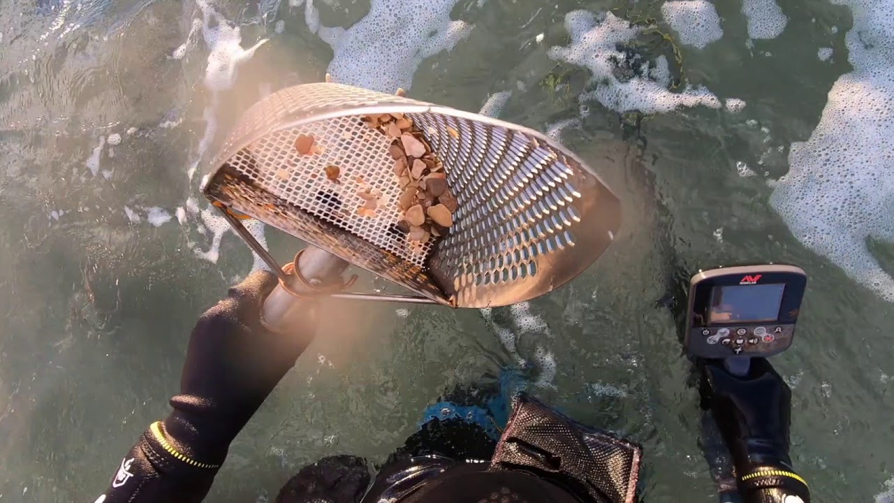 Another rough day metal detecting in the surf - sea water, lots of ...