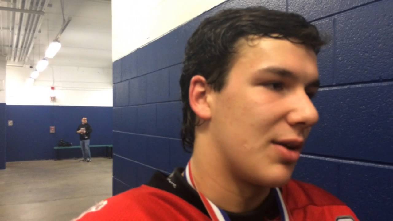 Romeo Hockey Player Logan Jenuwine Talks About State Title - YouTube