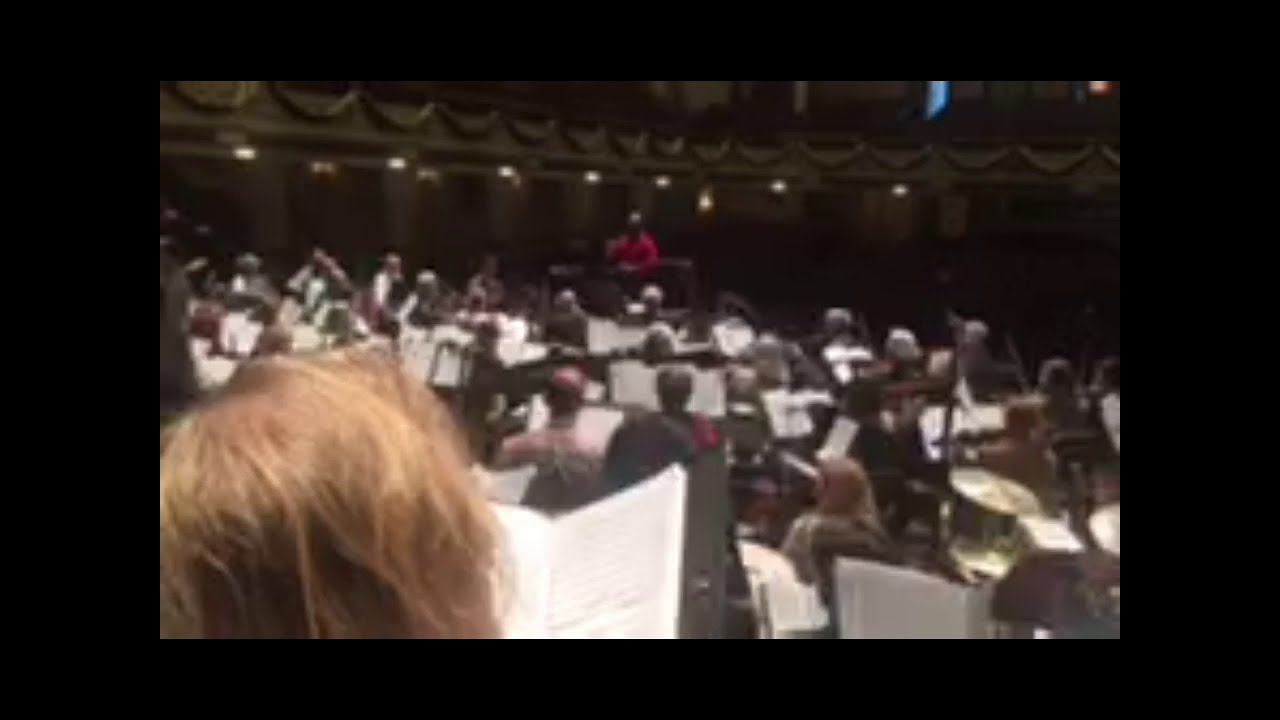 Kevin Sharpe conducting a run through before an orchestral concert ...
