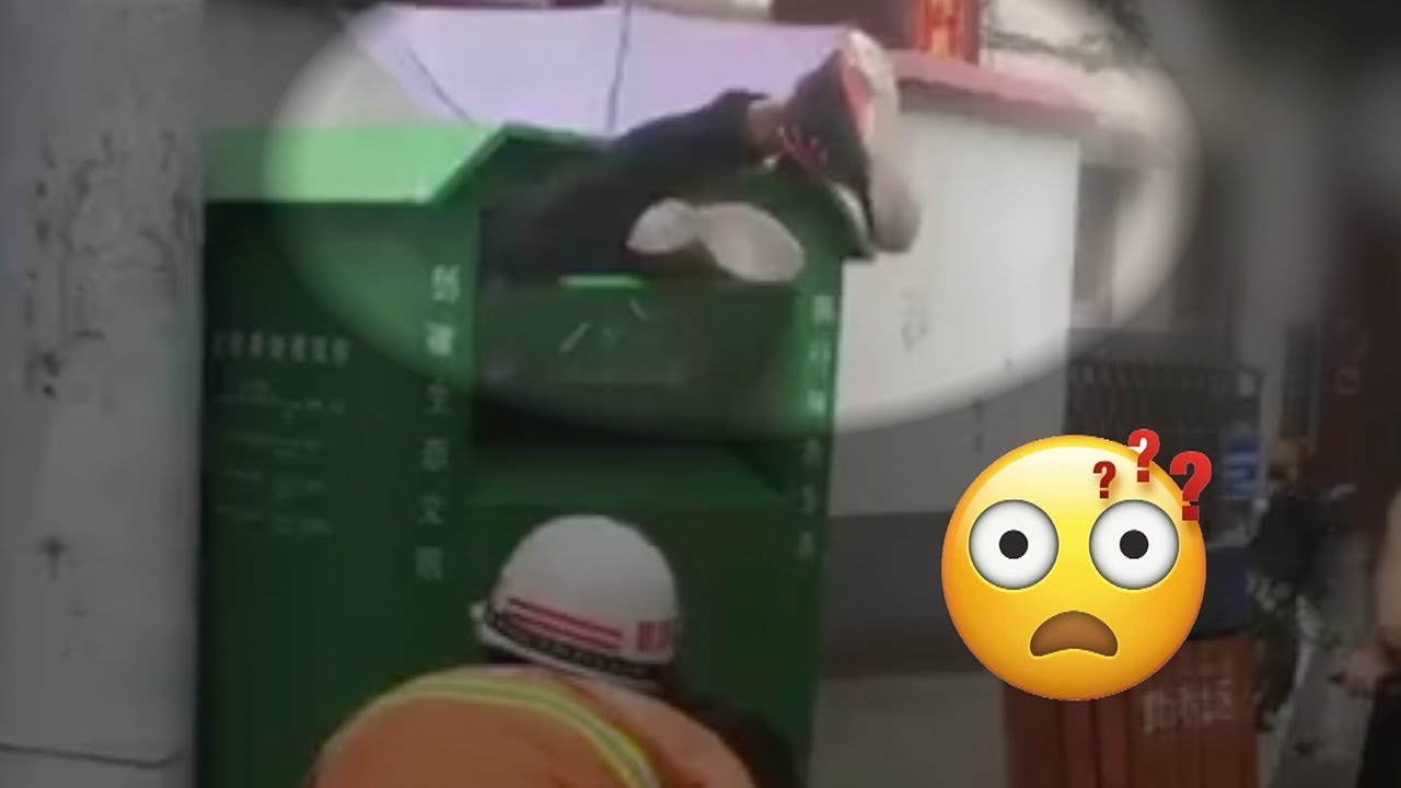 A man gets stuck inside a clothing collection bin - YouTube