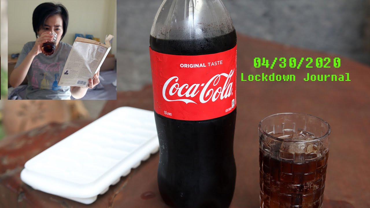 Enjoying an ice cold Coke on a very hot summer afternoon in the ...