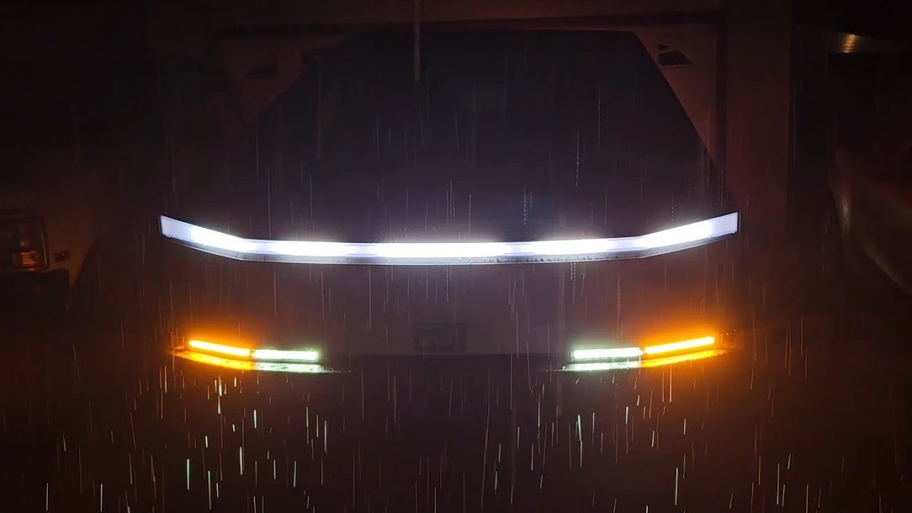 Tesla Cybertruck The Arrival Light Show At Night in the Rain Without ...