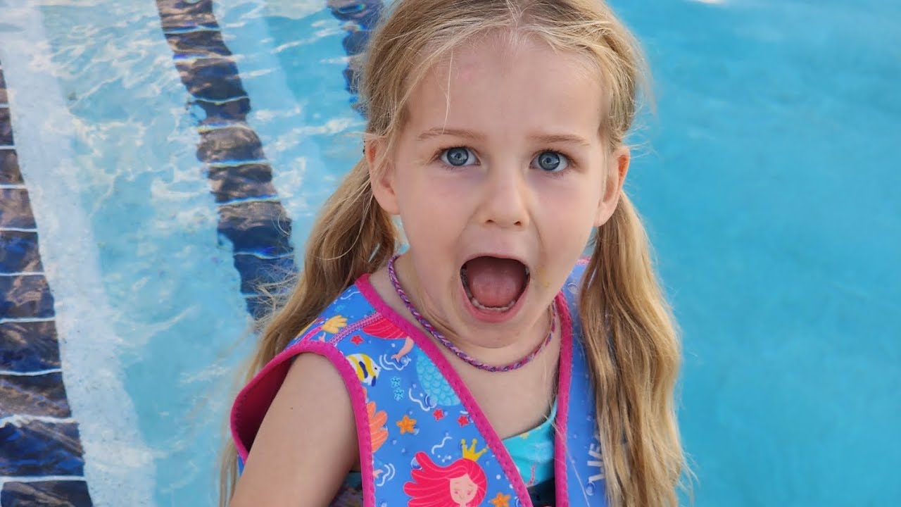 Junifer in the playpen and the pool - YouTube