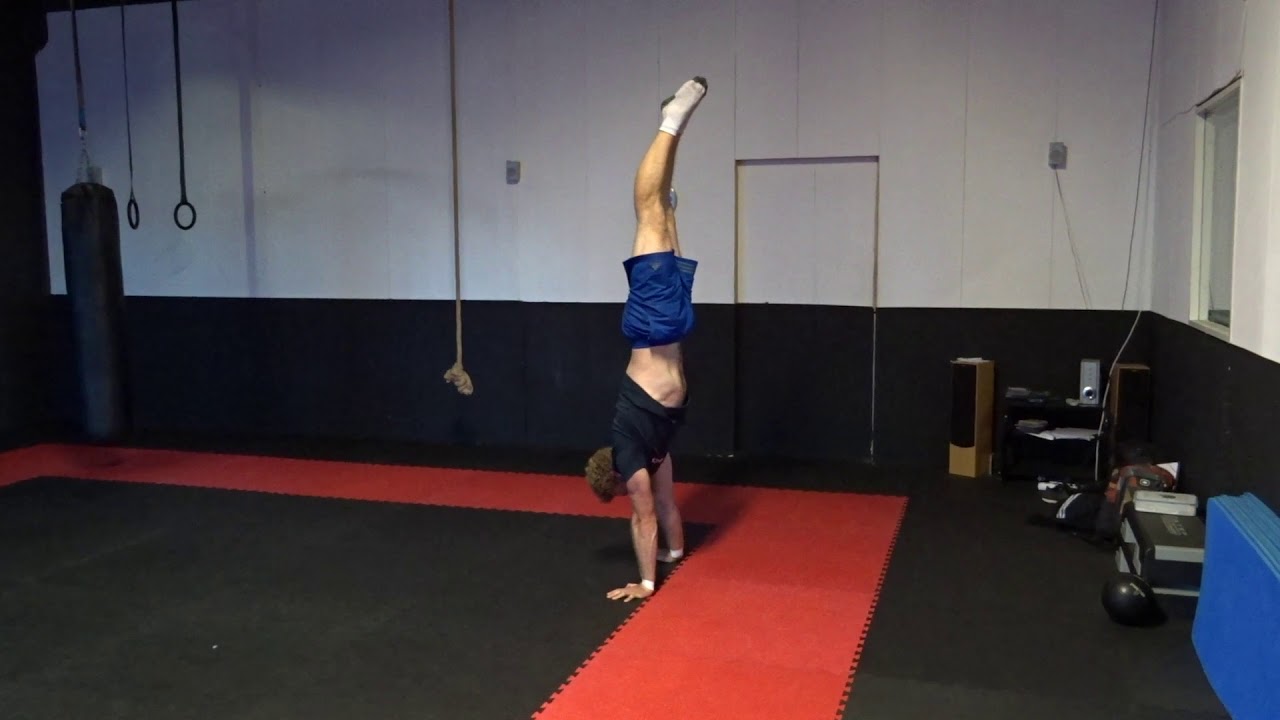 Handstand pike press jump - YouTube