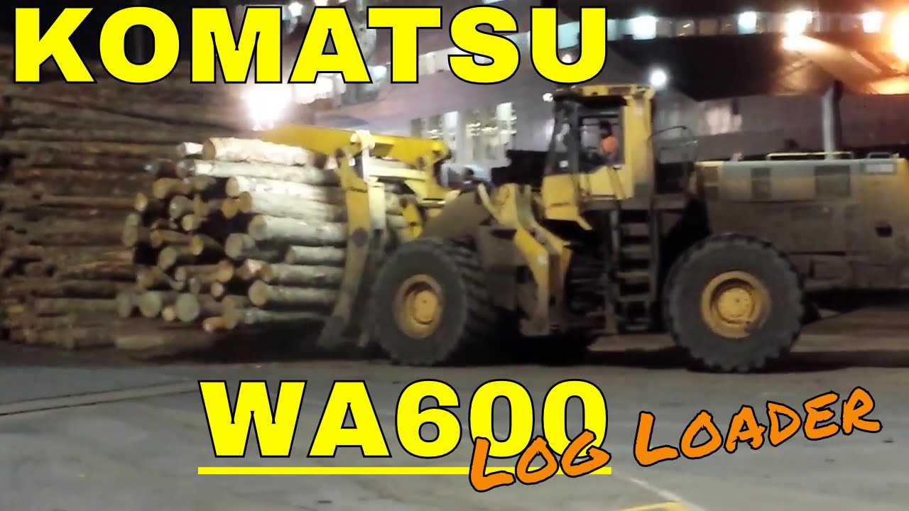 KOMATSU WA600 Log Loader working in a Export Log Yard - YouTube