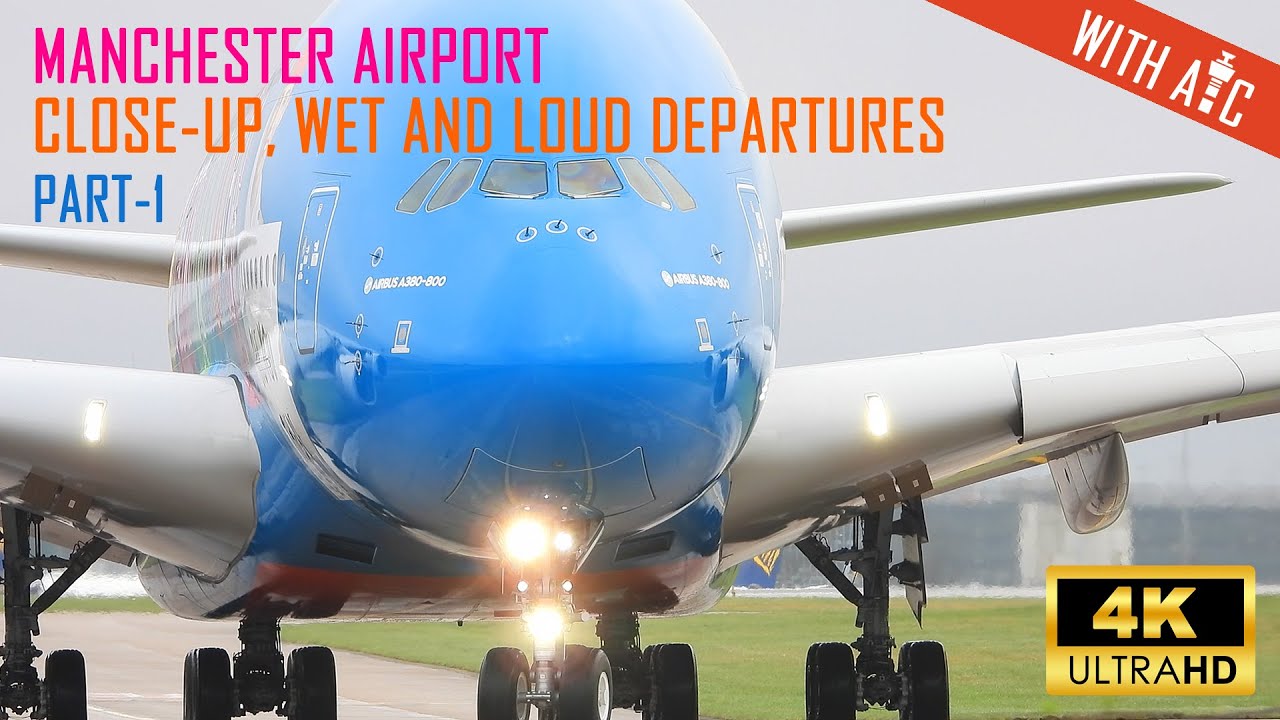 Close-up, Wet And Loud Departures at Manchester Airport South Side with ...