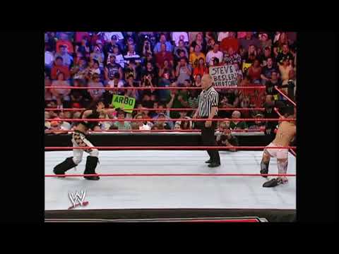 Melina  Running Double Knees Choke to the second rope to Candice Michelle