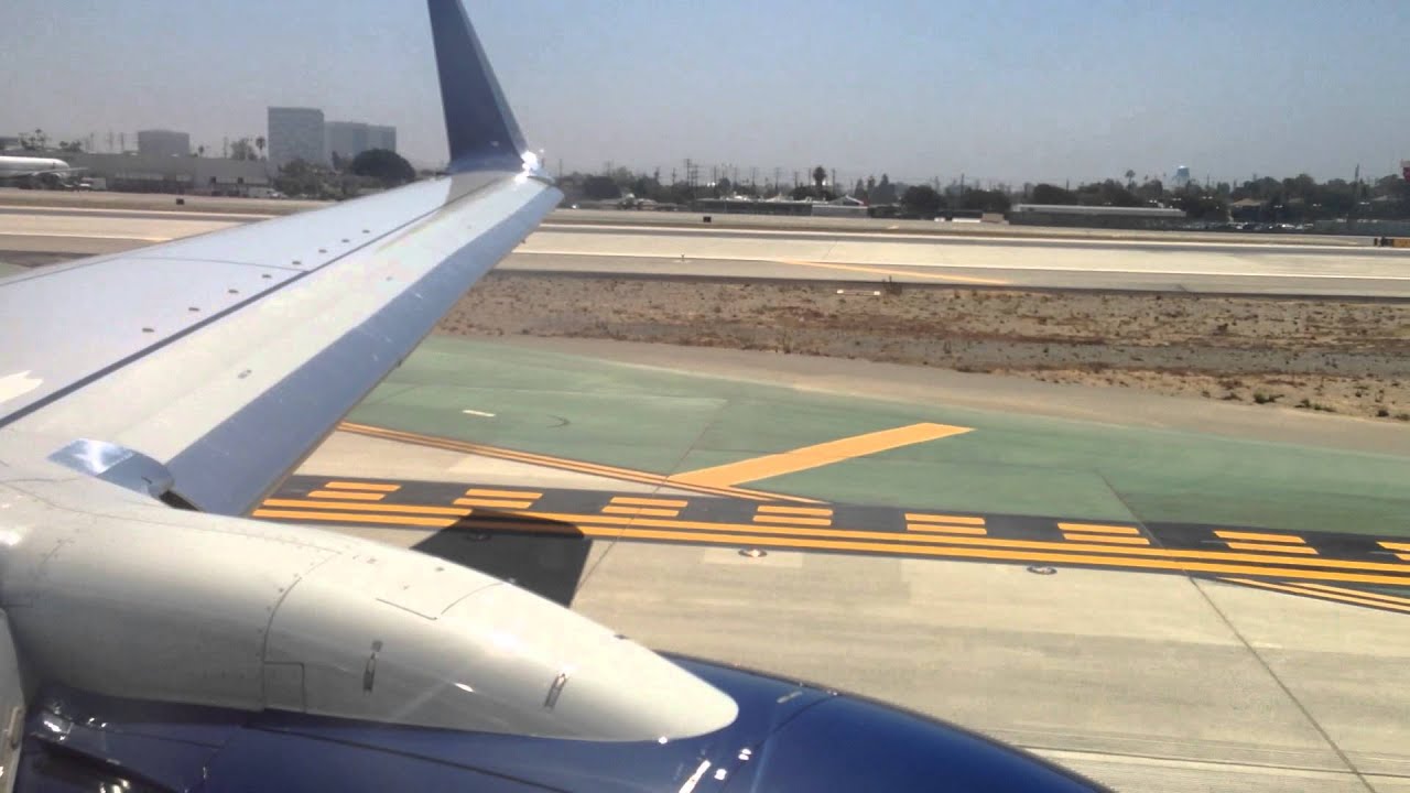 Delta Boeing 737-900ER Landing and Taxi to the Gate at Los Angeles ...