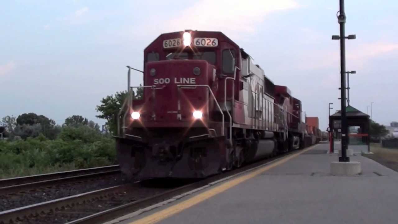 HOT! CP 142 through Dixie GO station with a SOO Line SD60 on point! 7/6 ...