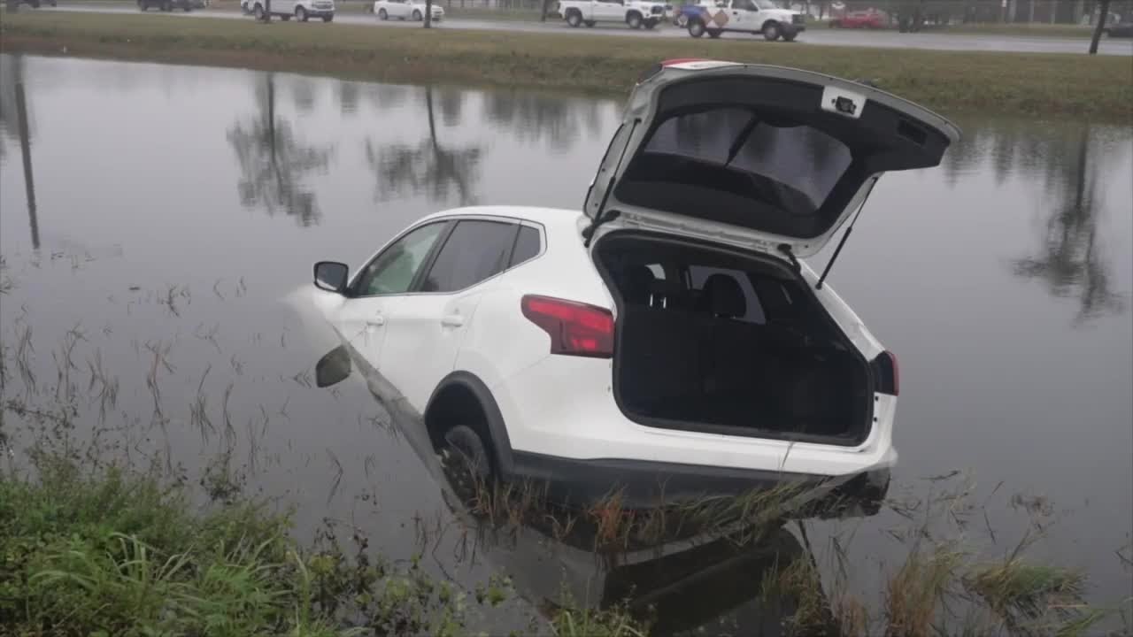 The story behind the viral photo of a car submerged underwater in Cape ...