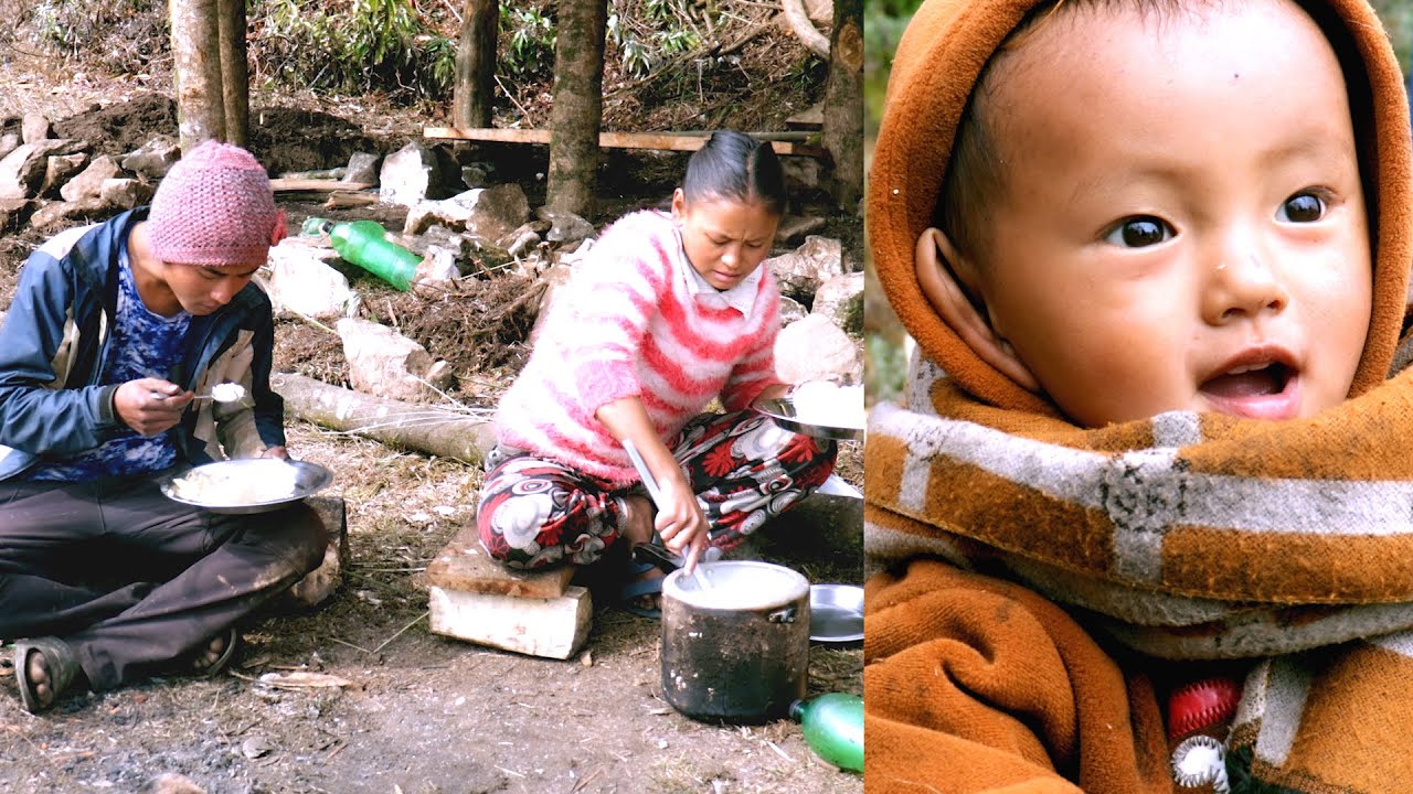 Little cute baby is enjoying meal with her young parents || Natural ...