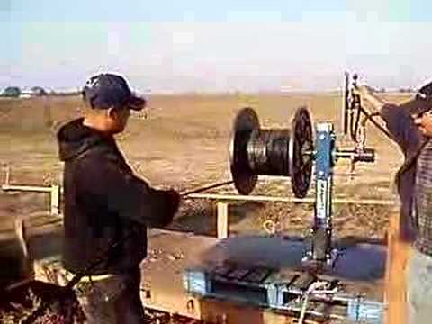 Eatwell Farm winding in drip line for reuse another year - YouTube