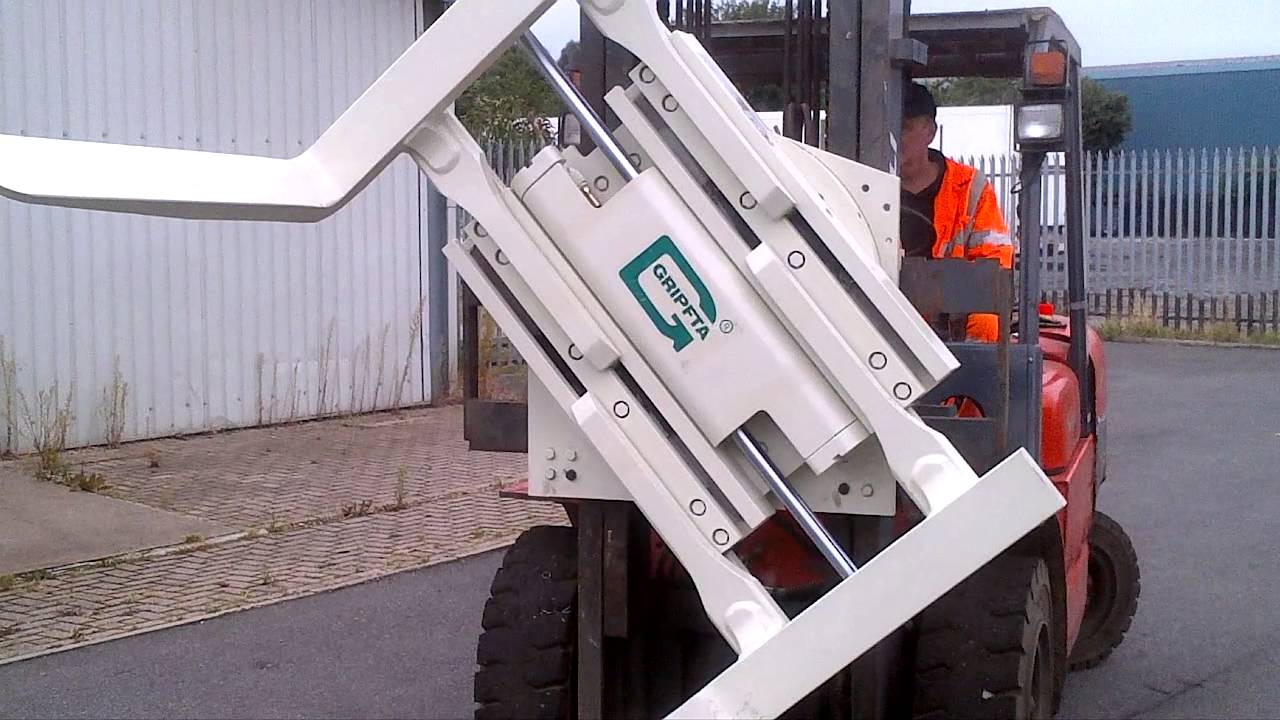 Gripfta Rotating fork clamp ,scrap handling - YouTube