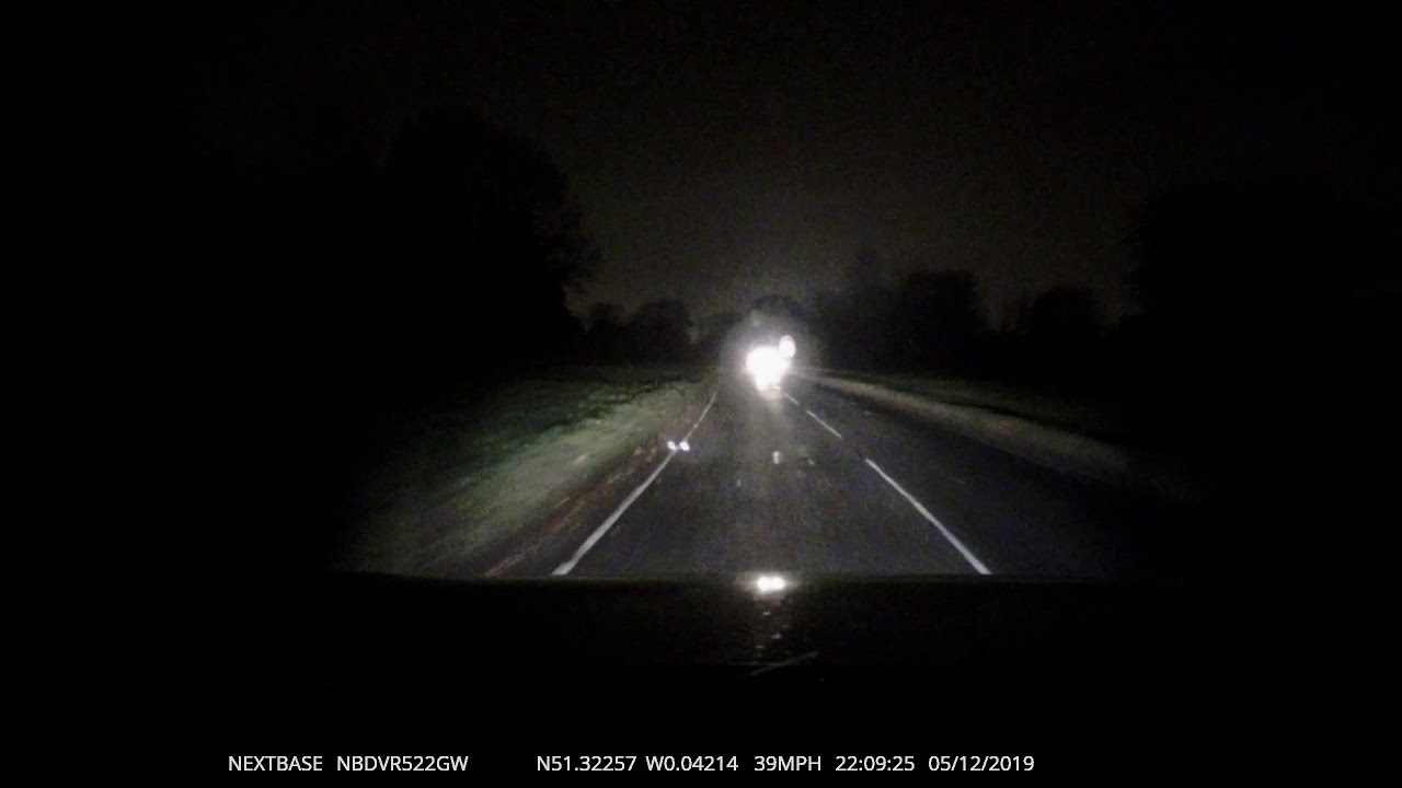 MG ZS EV lights auto main beam with Osram Nighbreakers on a damp road ...
