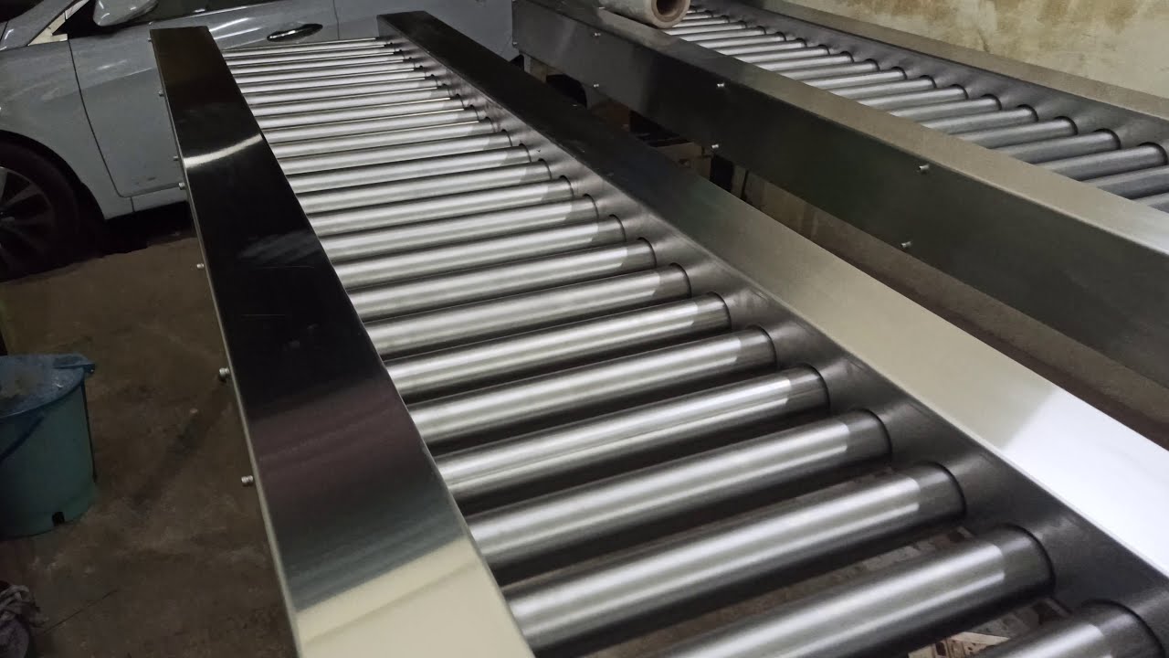 Orange Conveyor Systems - CDLR -Chain Driven Roller Conveyor - YouTube