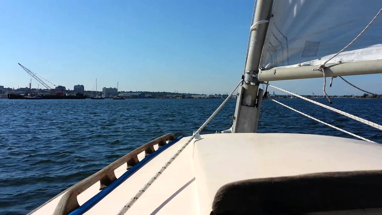 Herreshoff America Catboat sailing thru the Dike - YouTube
