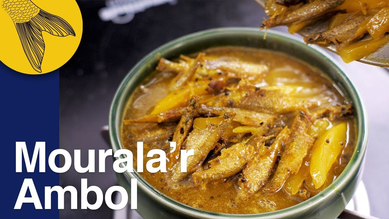 Mourola machh'er ambol/tok aam diye—small Mourala fish with green ...