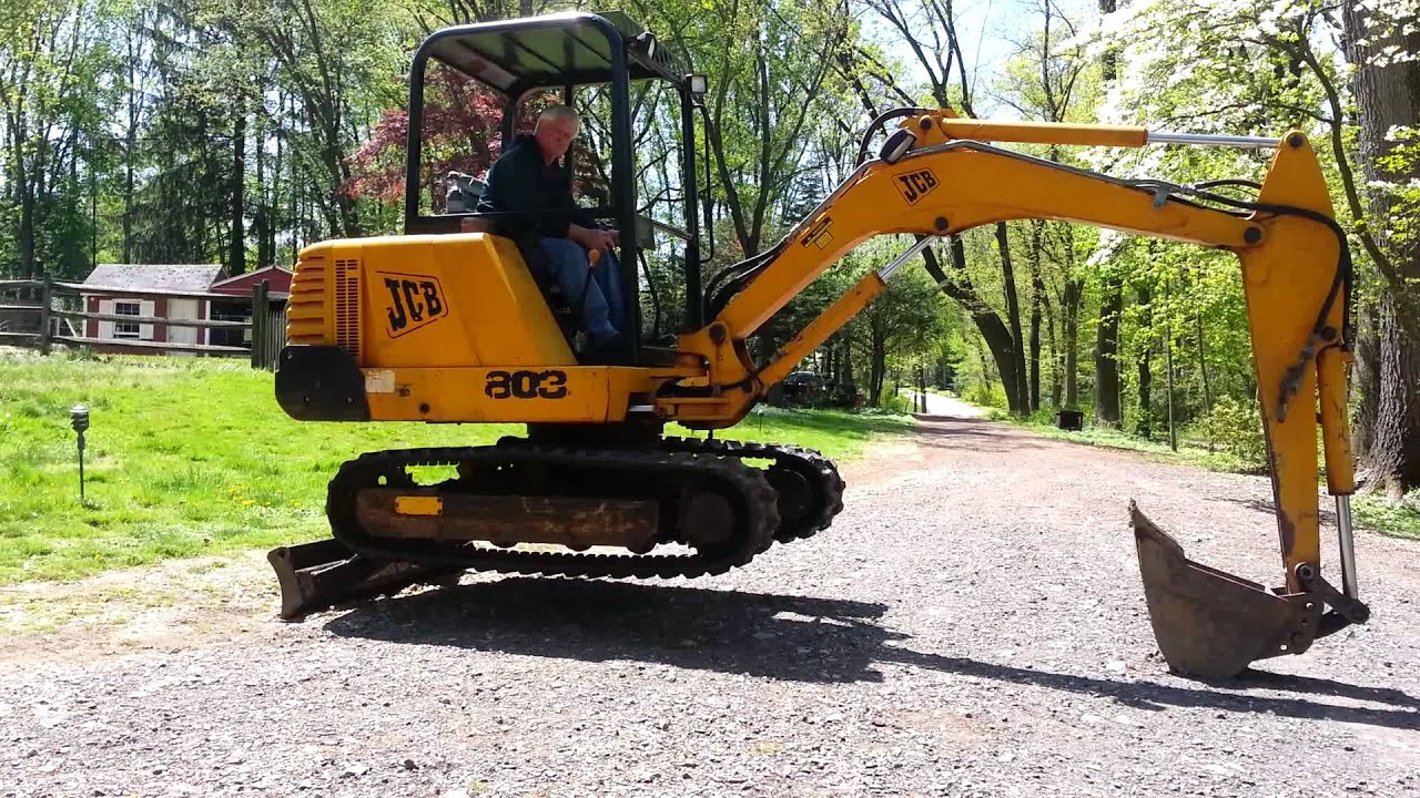 JCB 803 in air - YouTube
