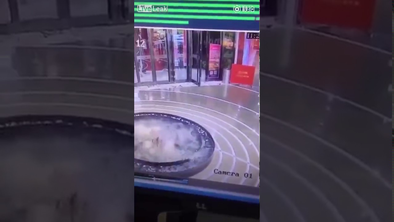 Woman texting, falls into fountain - YouTube