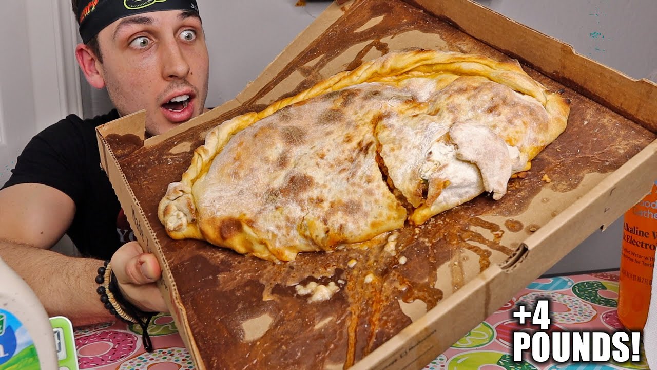 THE BIGGEST CALZONE IN HOUSTON FOOD CHALLENGE| MAN VS FOOD - YouTube