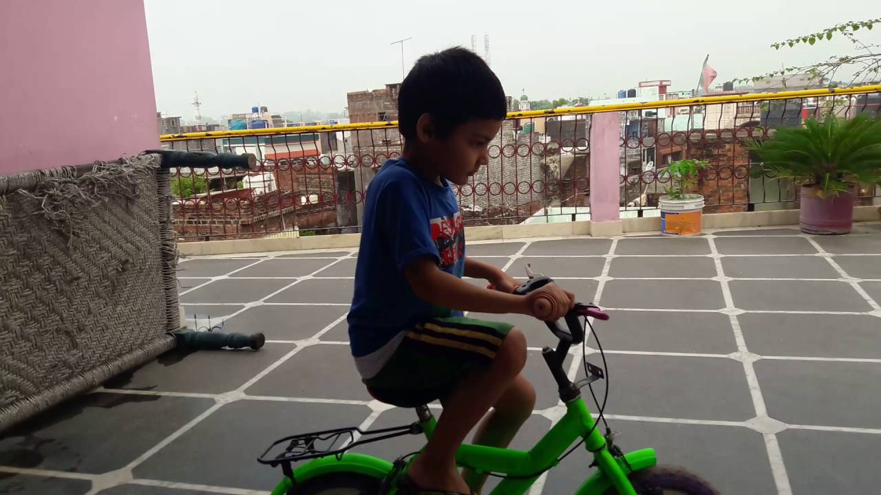 children playing cycle(1) - YouTube