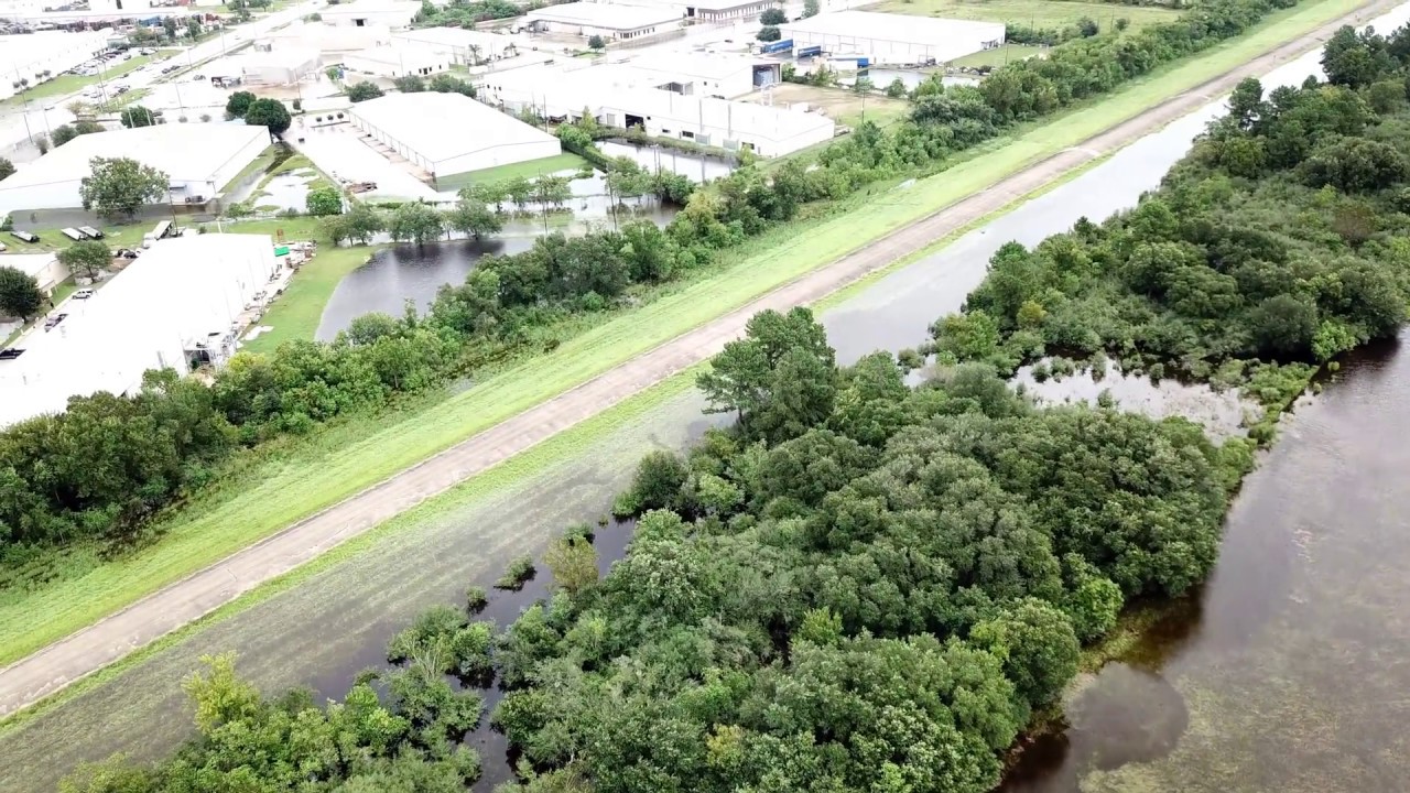 Addicks Reservoir Overtopping Levee Footage - Harvey Aftermath - YouTube