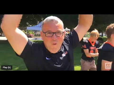 High school football coaches show off vertical leaps, or try, at MLive Muskegon media day