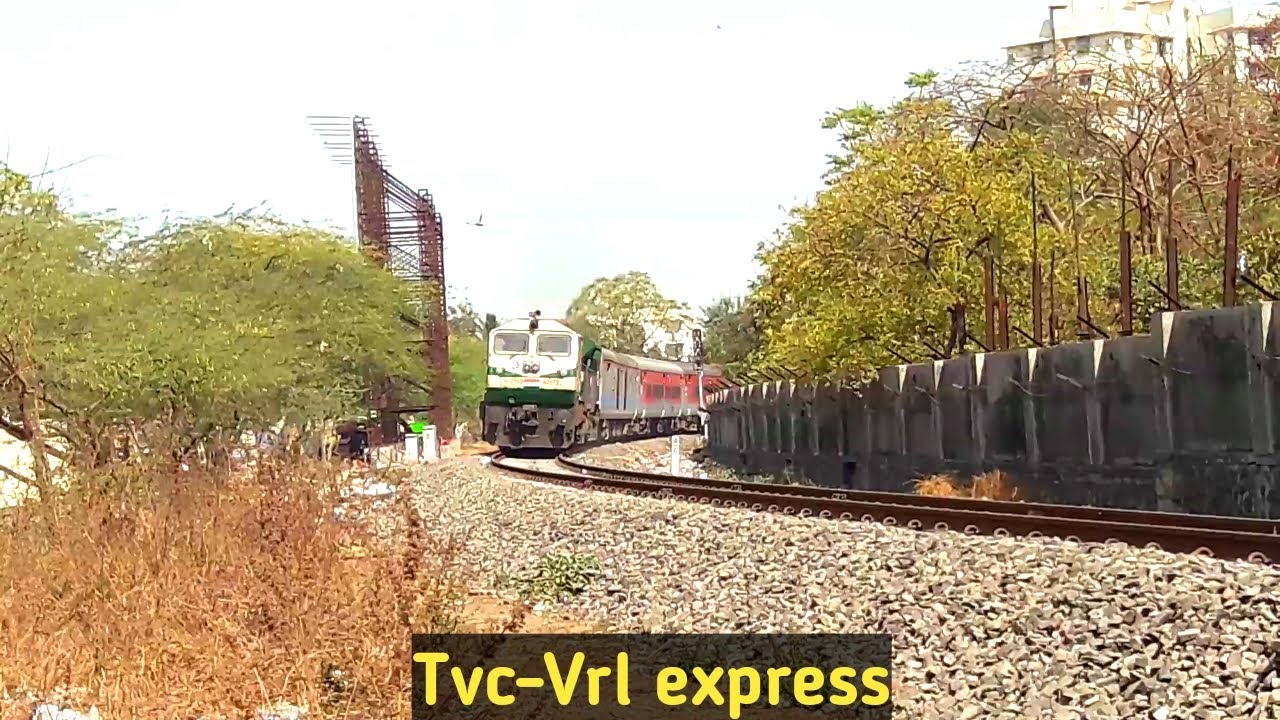 06334 TVC-VRL EXPRESS SPL CURVING ENTRY AT BHAKTINGAR STATION OUTER ...