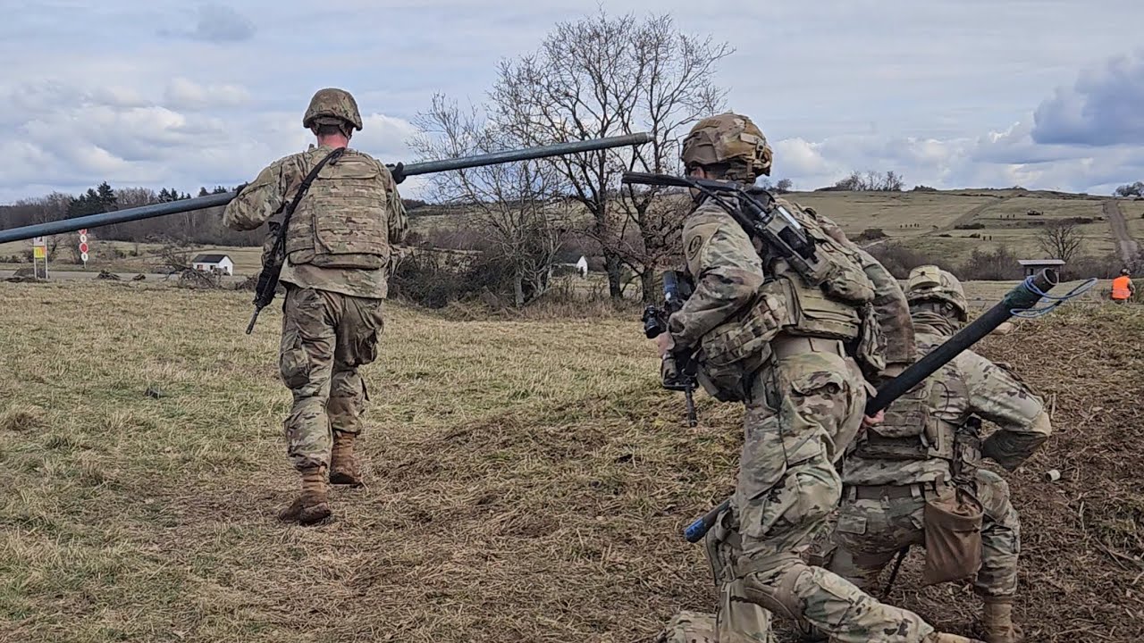 ARMY SAPPERS SET UP BANGALORES DURING LIVE FIRE TRAINING EXERCISE # ...