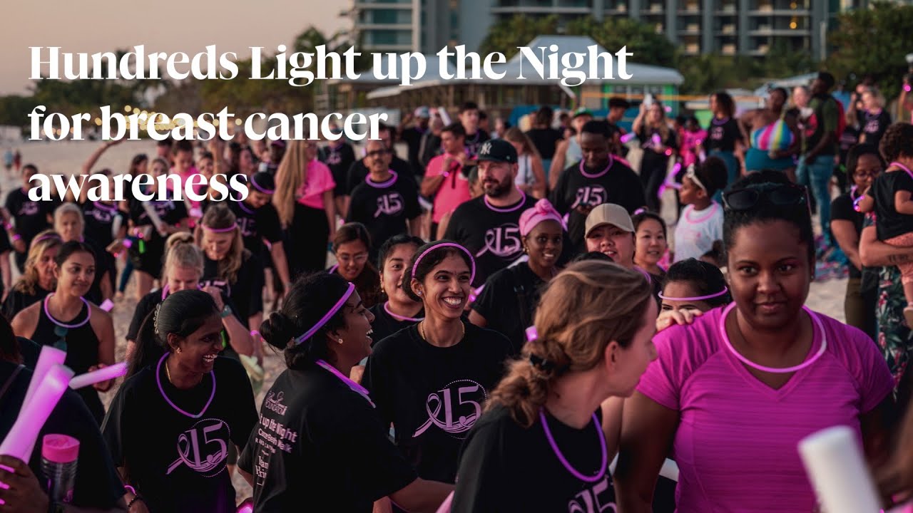 Hundreds Light up the Night for breast cancer awareness - YouTube