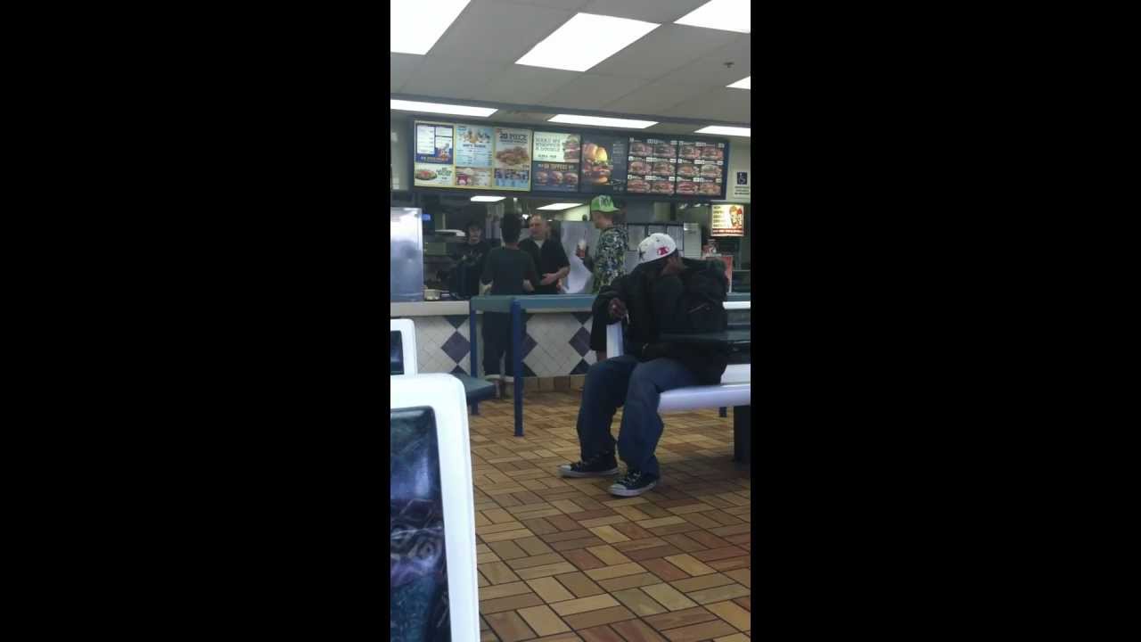 A fight breaks out between customers and staff at Burger King because ...