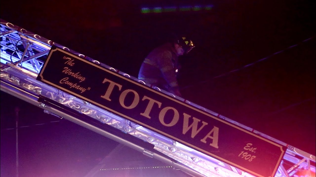 Totowa NJ Fire Department operates at an electric fire in a wall of a ...