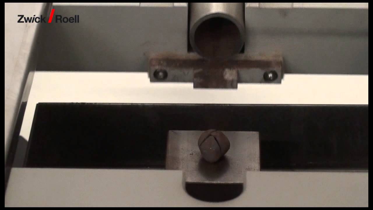 Compression tests on iron ore pellets - Druckversuche an ...