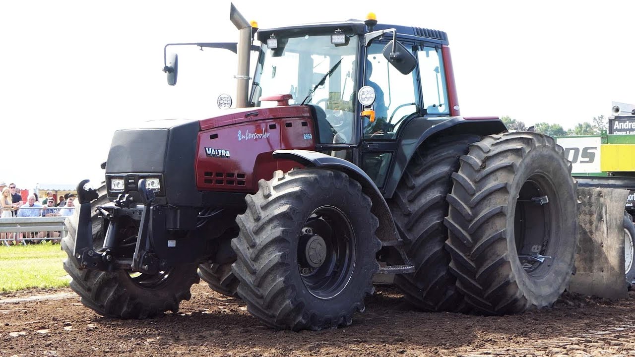 Different Volvo BM & Valmet Tractor on duty in front of the sled ...