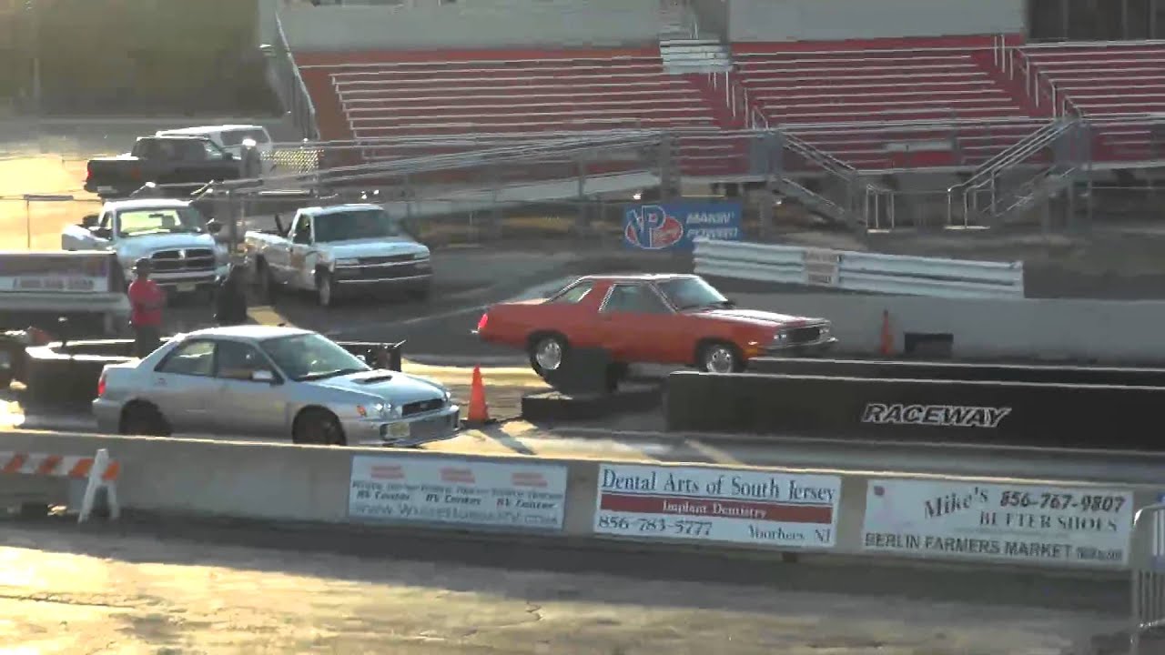 Subaru STi gt35r 18psi 11.9@120 track passes stock block - YouTube