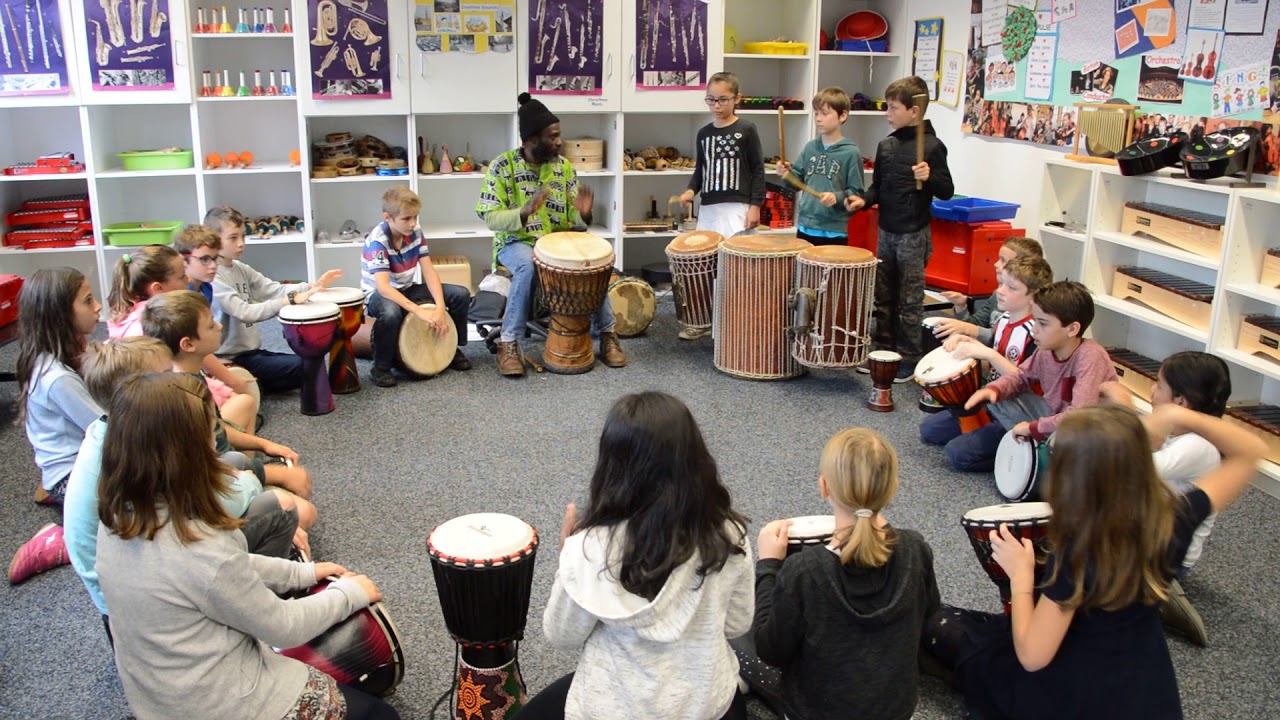 Primary Students Enjoying Djembe Session - YouTube