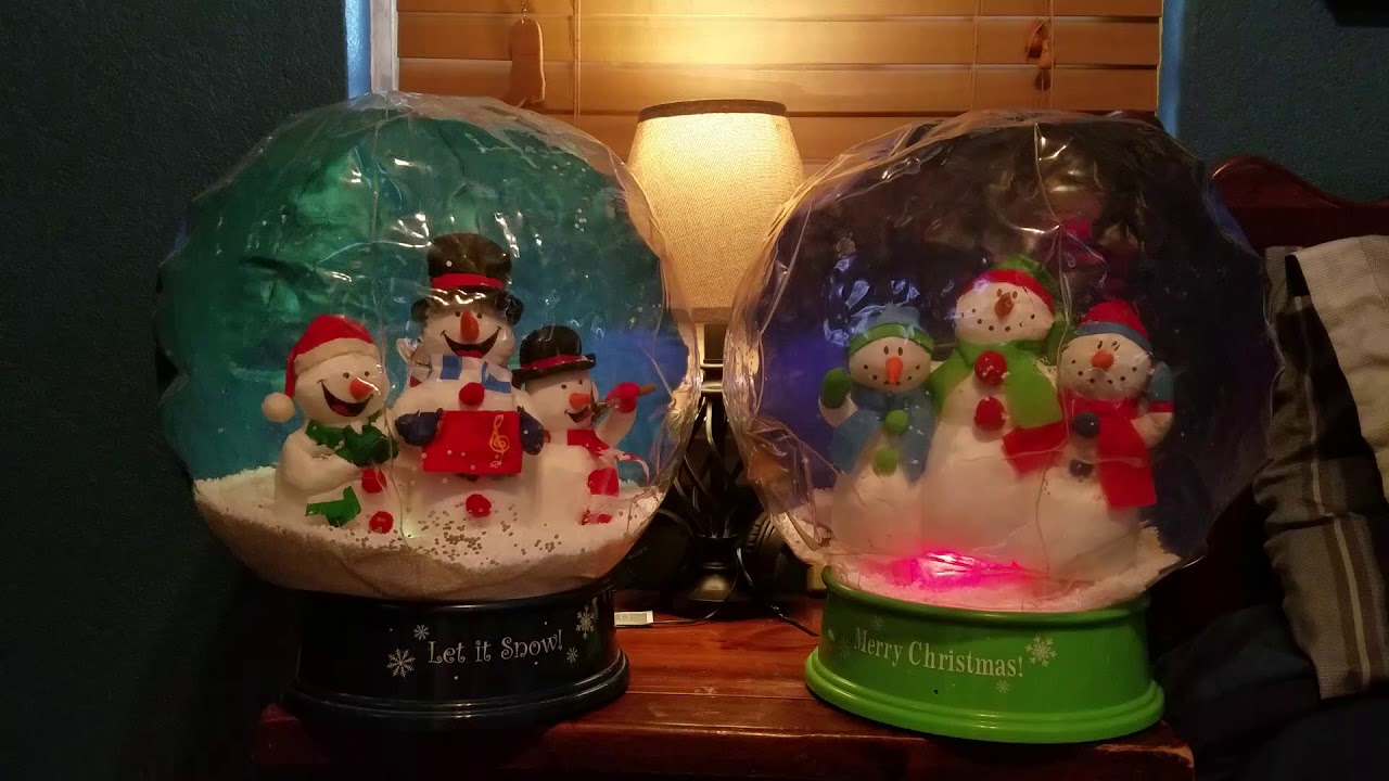 Two Gemmy Mini Inflatable Snow Globes - YouTube