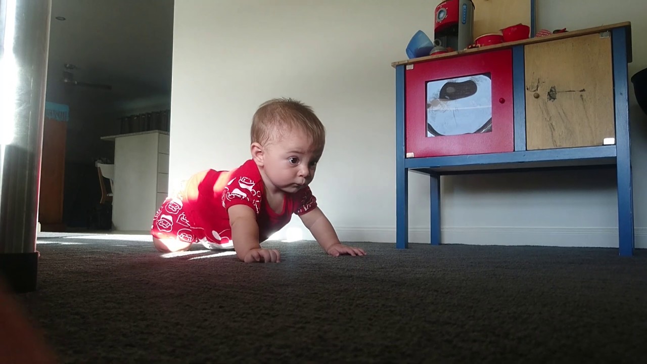 Commando crawling for some toys - YouTube