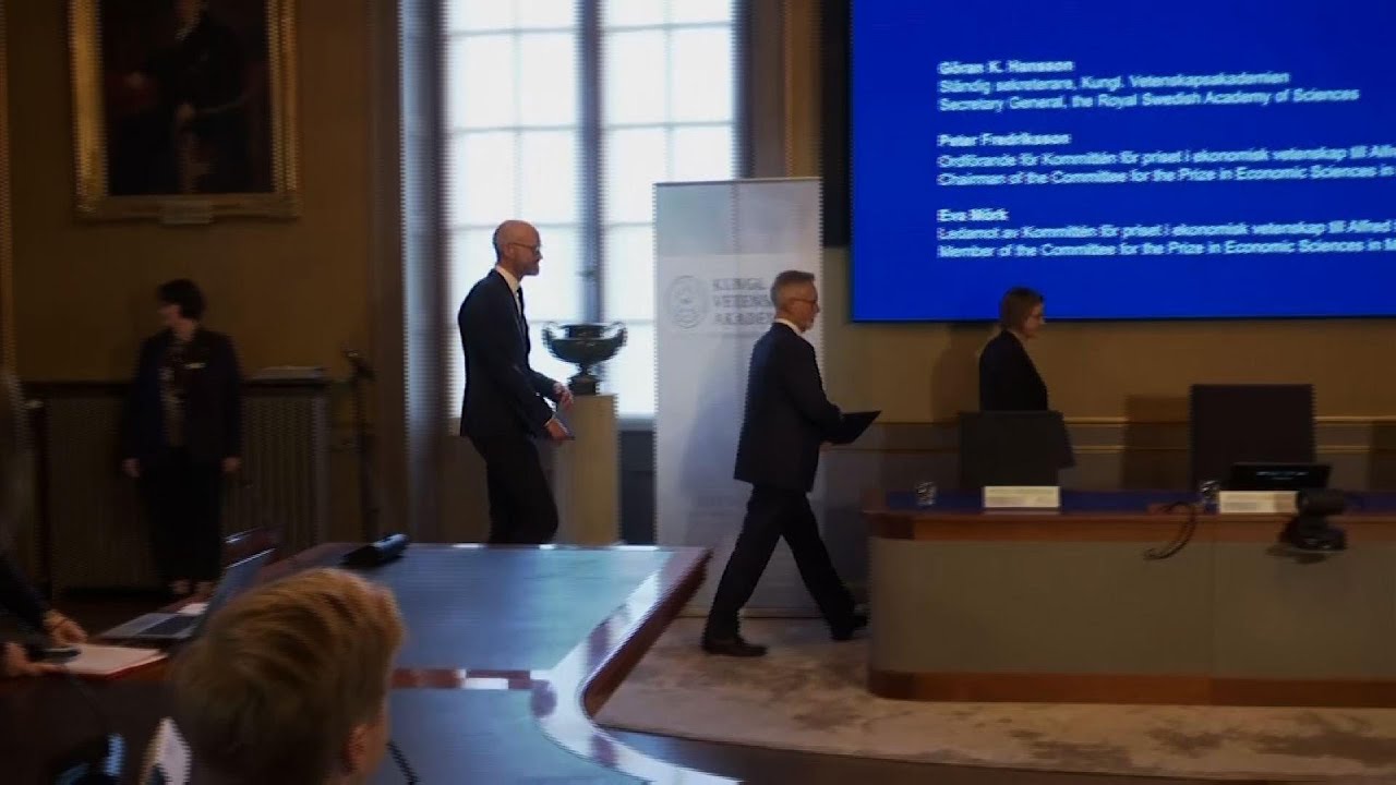 3 economists win Nobel for research on wages, jobs - YouTube