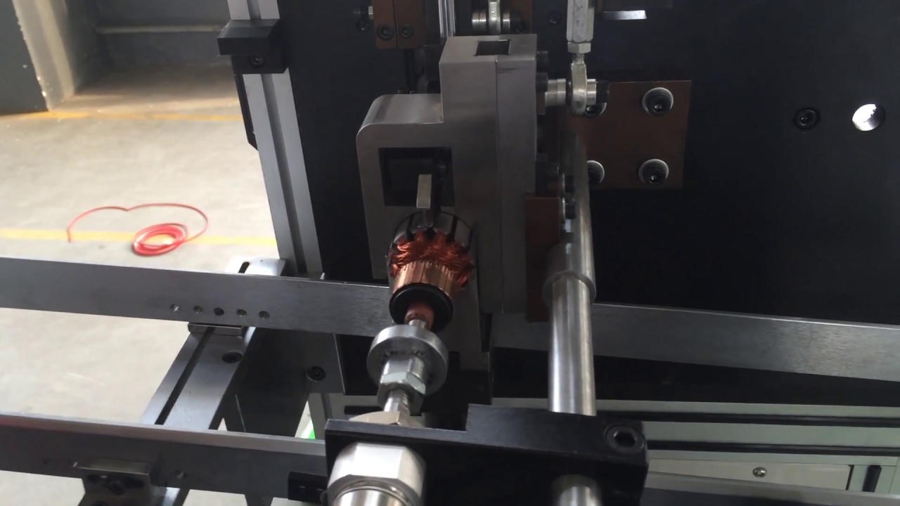 Automatic armature insulation paper inserting machine - YouTube