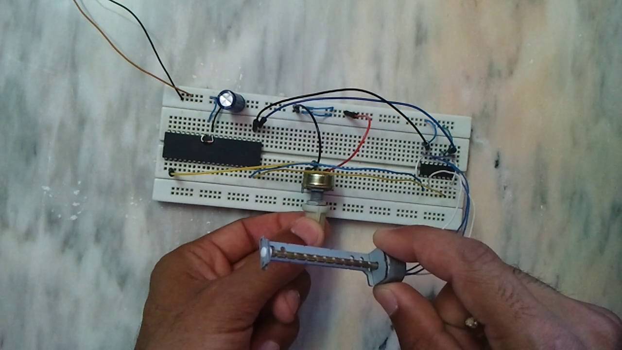 CD-ROM bipolar stepper motor drive with PIC18F4550 and L293D-CCS PIC C ...