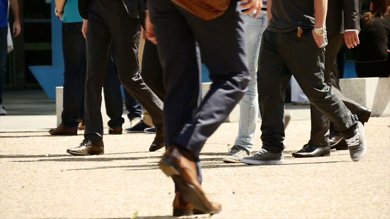 group of people walking slow motion feet foots team gang urban lief ...