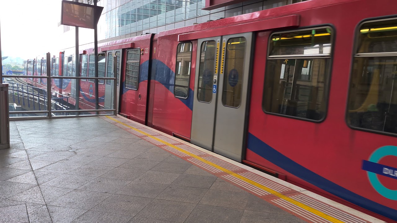 DLR B2K Stock 62 Arriving Canary Wharf - YouTube